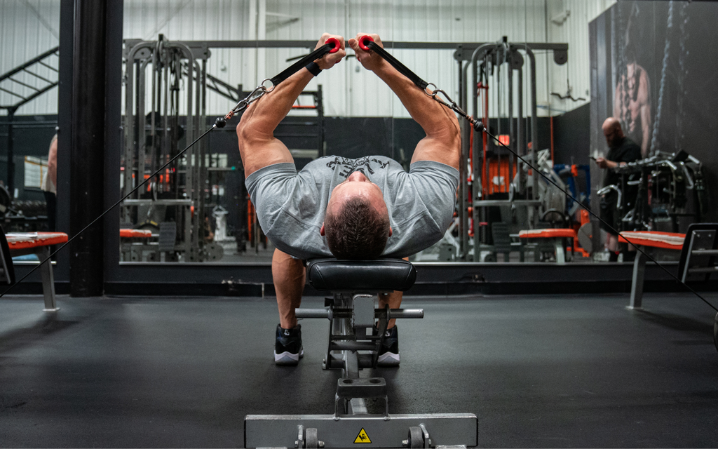 Flat Bench Cable Fly Exercise Instructions and Tips — Tiger Fitness